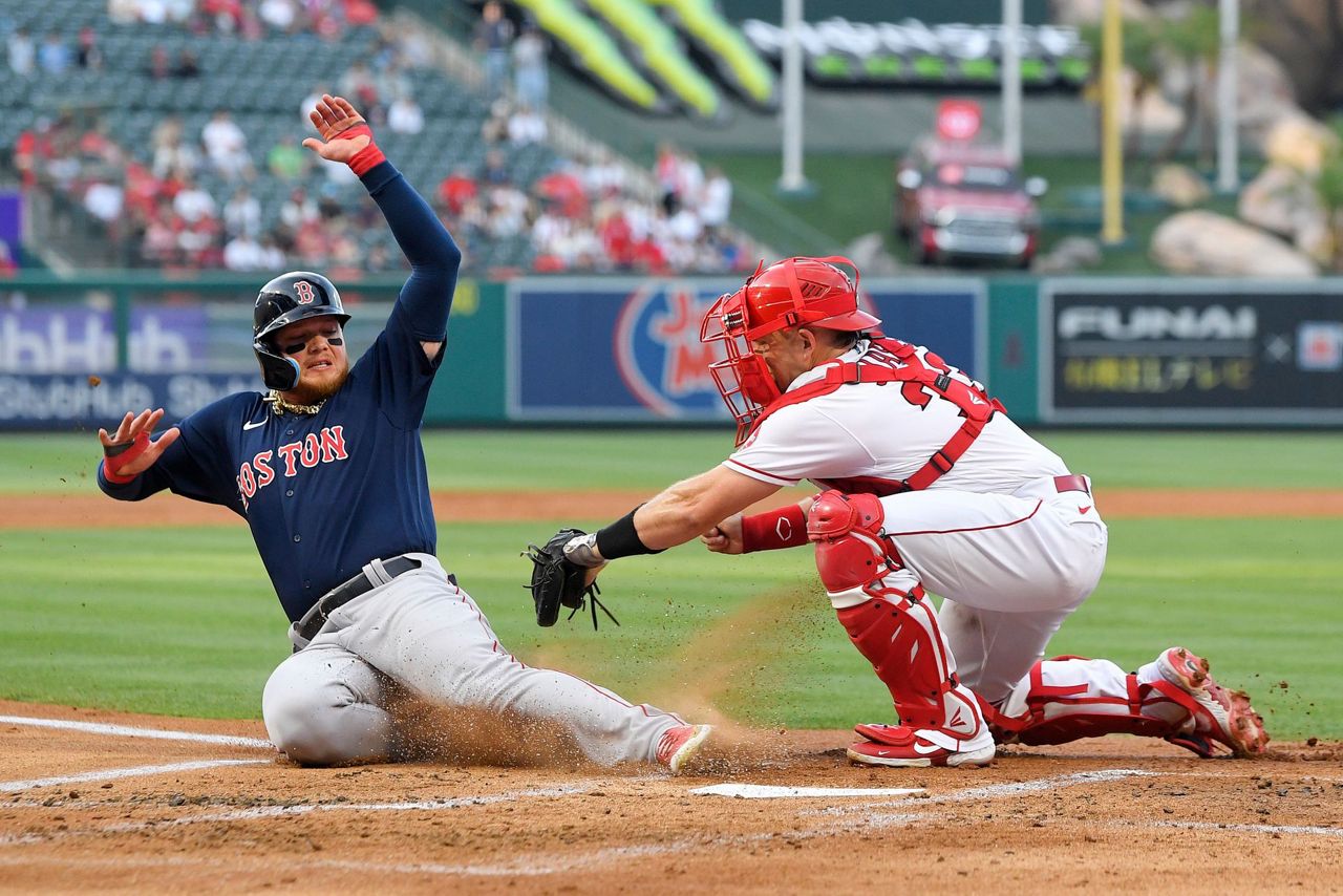 Ohtani carries Angels past Boston, ending LA's 14-game skid