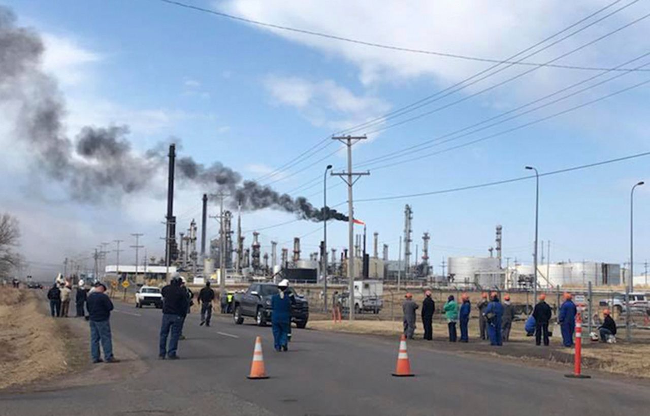 The Latest: Evacuation order lifted following refinery fire