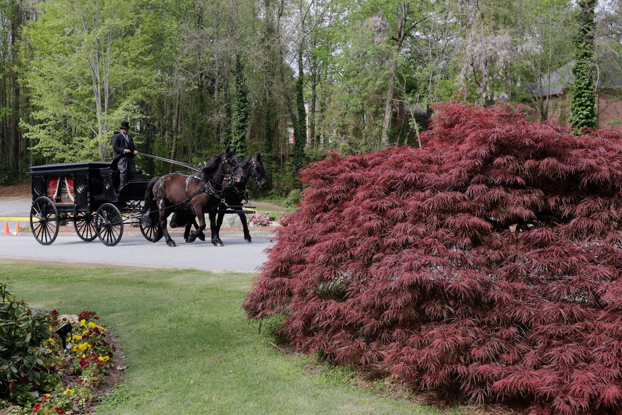 Civil rights hero Lowery honored at private Atlanta funeral