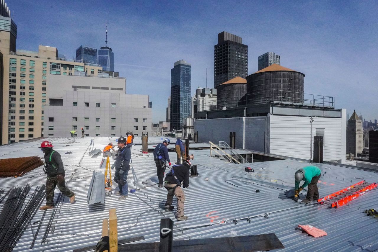 Cities reviving downtowns by converting offices to housing