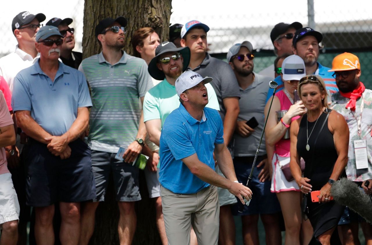 Lashley leads wire-to-wire in Detroit for 1st PGA Tour win