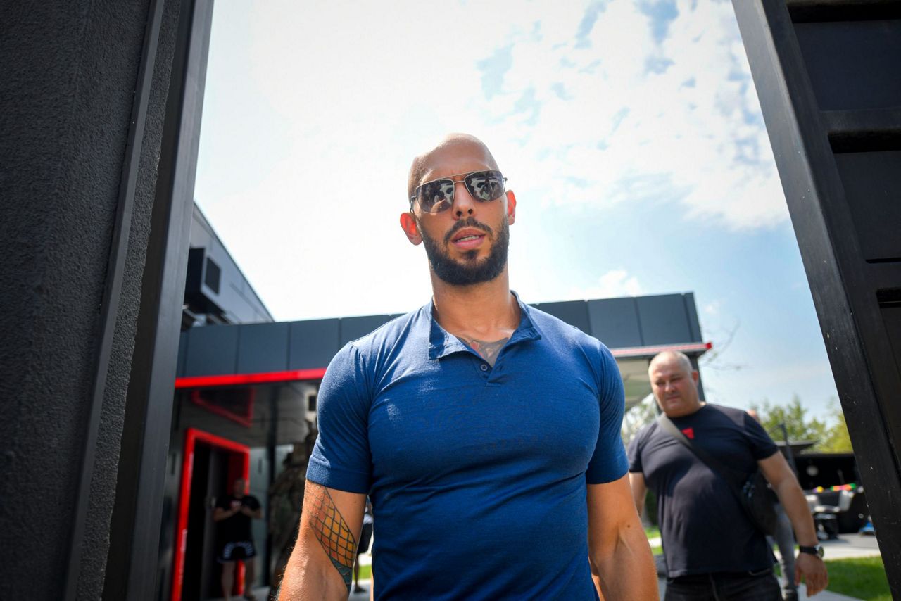 Influencer Andrew Tate released from house arrest while he awaits human trafficking and rape trial