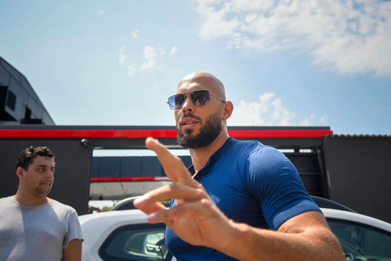 Influencer Andrew Tate released from house arrest while he awaits human trafficking and rape trial