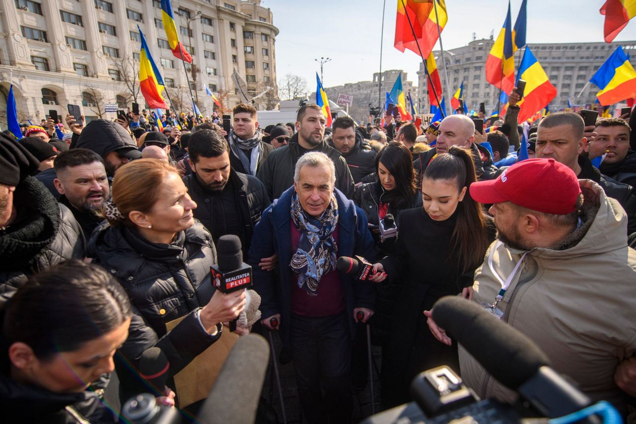 Thousands rally in Romania's capital to support far-right Georgescu ...
