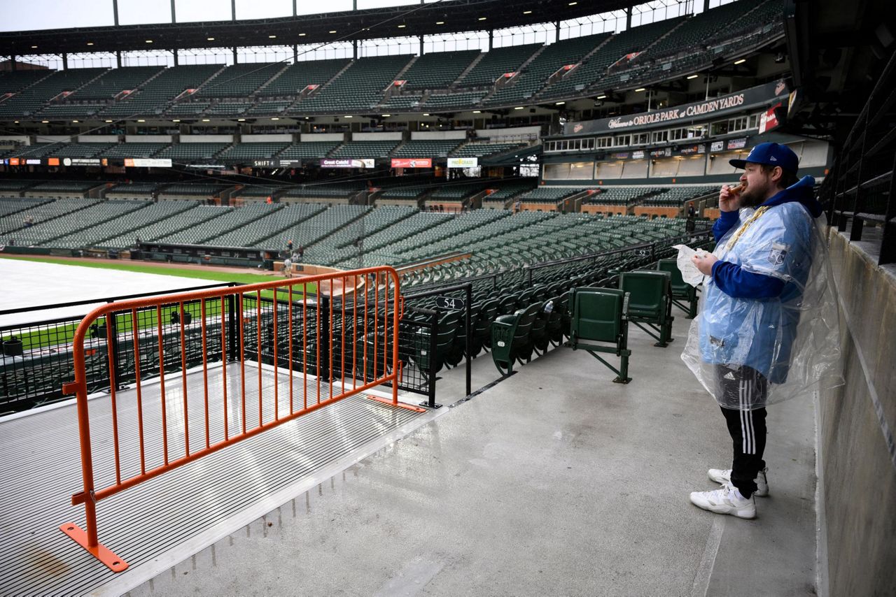 Patient fans wait out 5-hour rain delay for Royals vs. Orioles