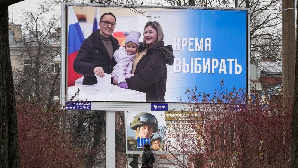 Russians head to polls in a vote set to extend Putin's rule