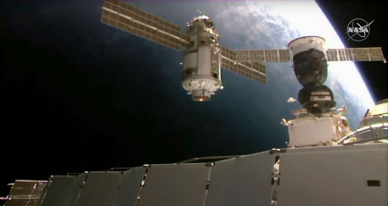 Russian lab module docks with space station after 8-day trip