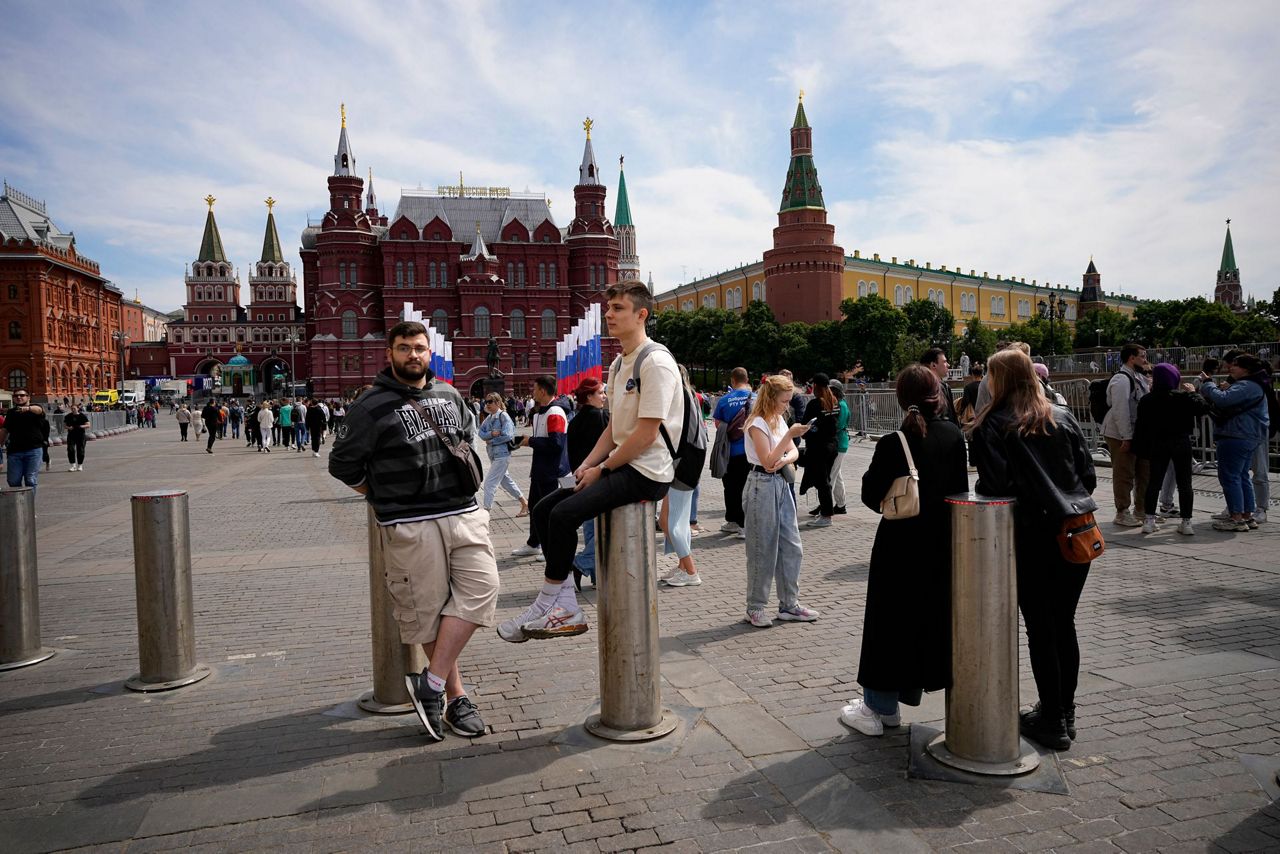 Putin uses public holiday to laud patriotic feelings as support for ...