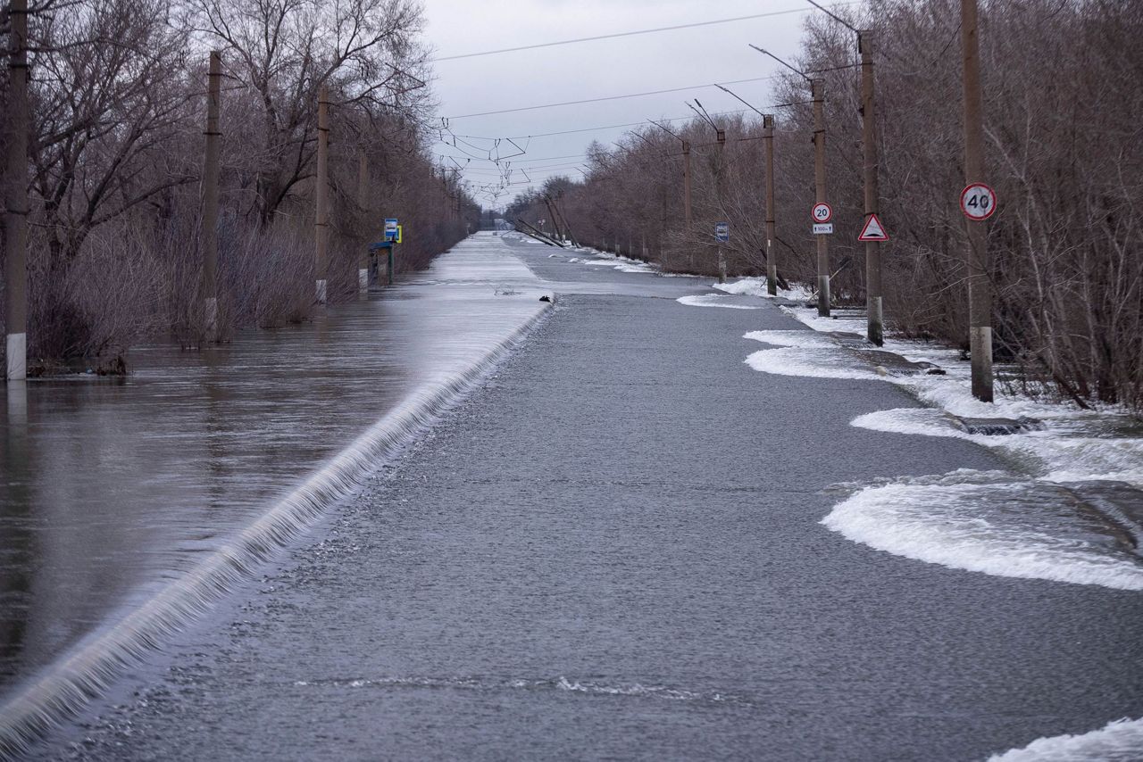 Russians stage a rare protest after a dam bursts and homes flood near ...