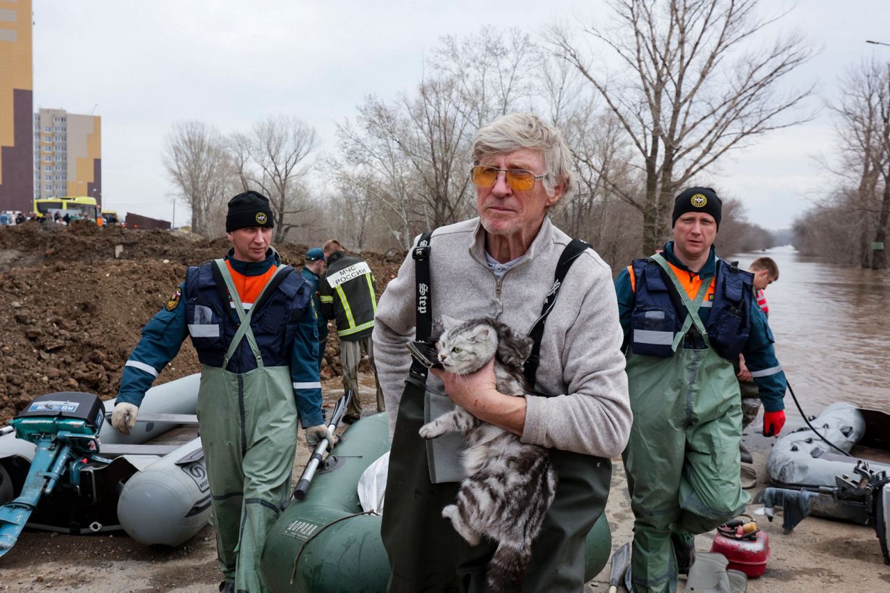 Water levels rise and homes flood in Russia after a dam bursts near the ...