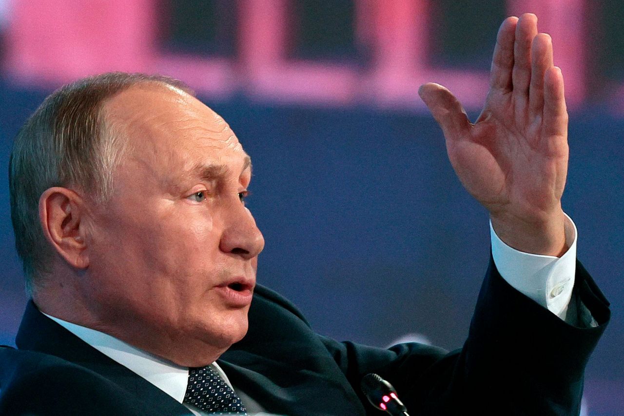 Putin mocks West, says Russia will press on in Ukraine