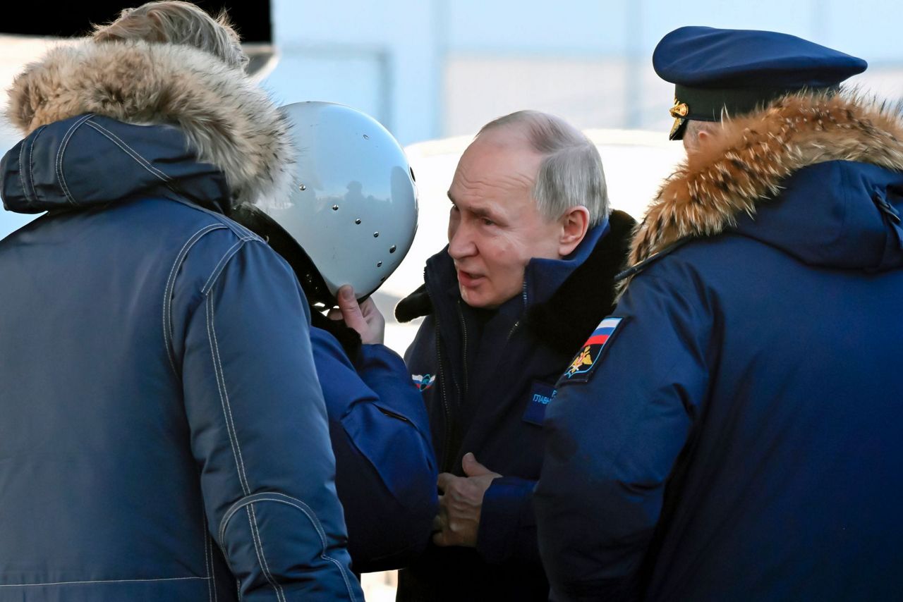Putin takes a flight in nuclear-capable bomber in a tough message to ...