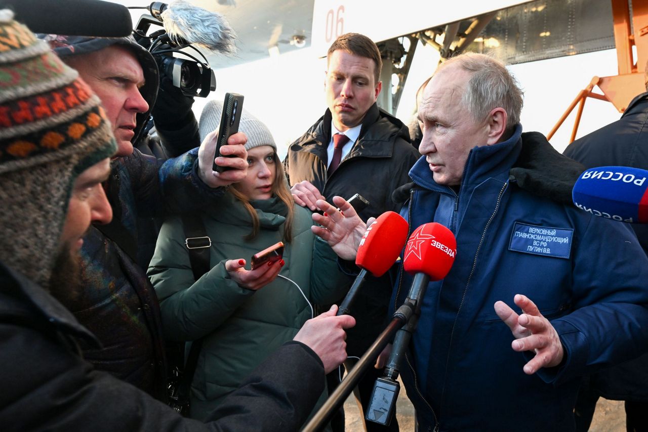 Putin takes a flight in nuclear-capable bomber in a tough message to ...