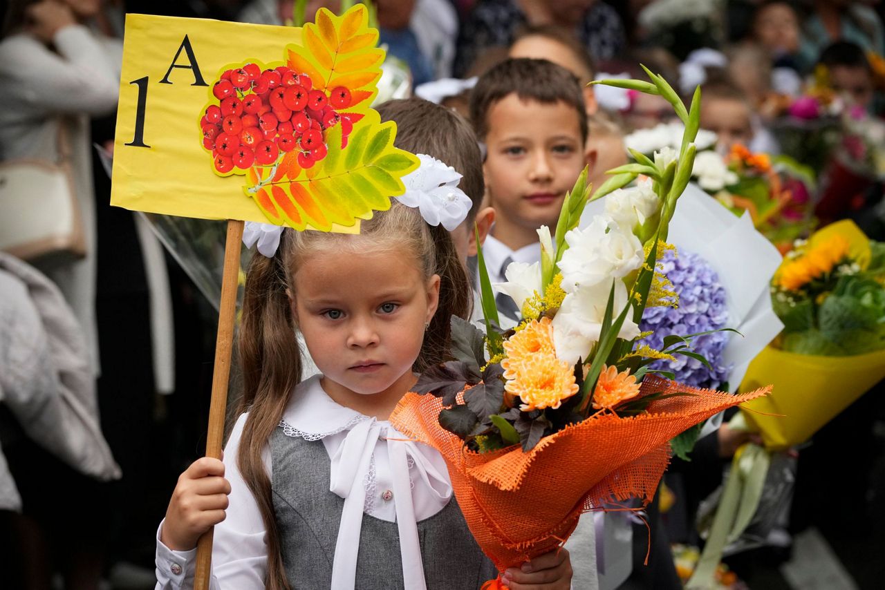 Russian students are returning to school, where they face new lessons ...