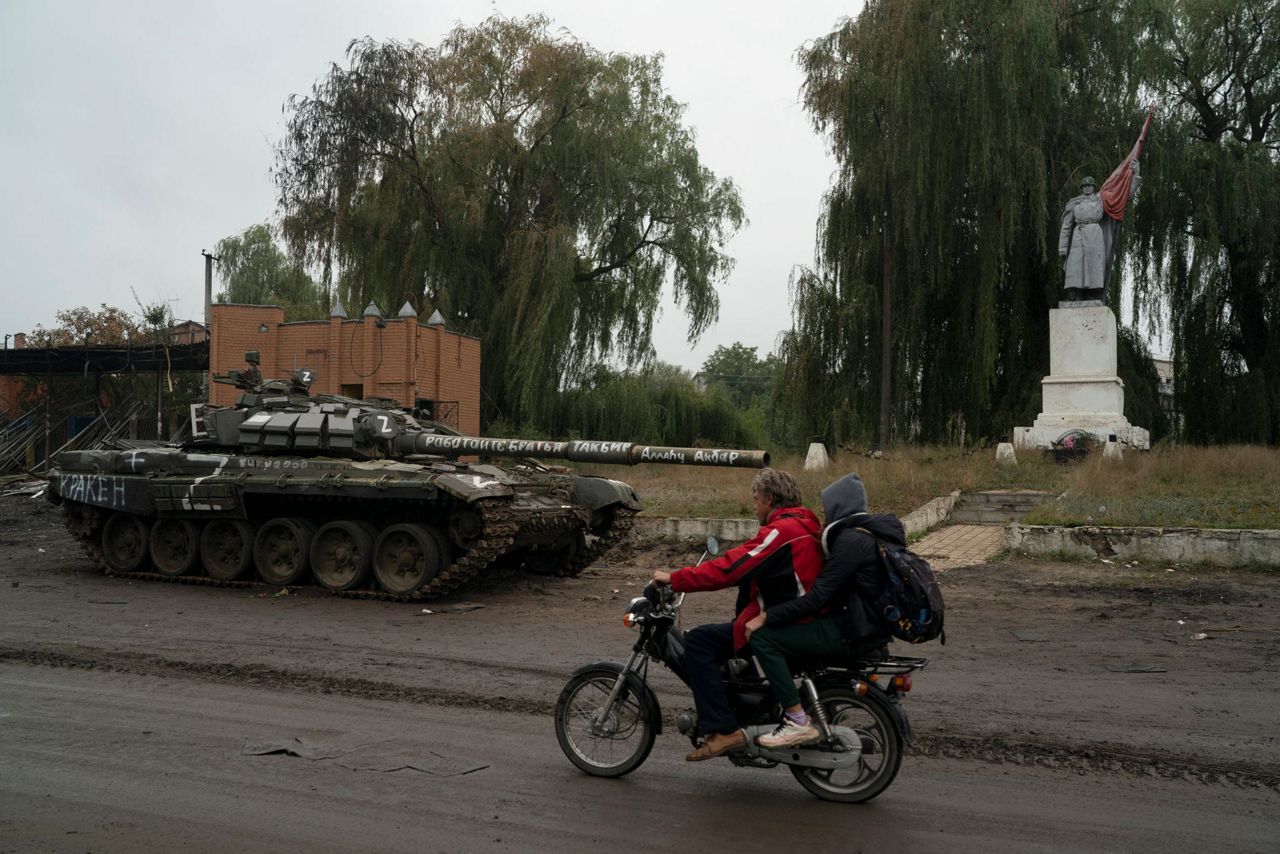 Zelenskyy visits liberated, but devastated, city of Izium