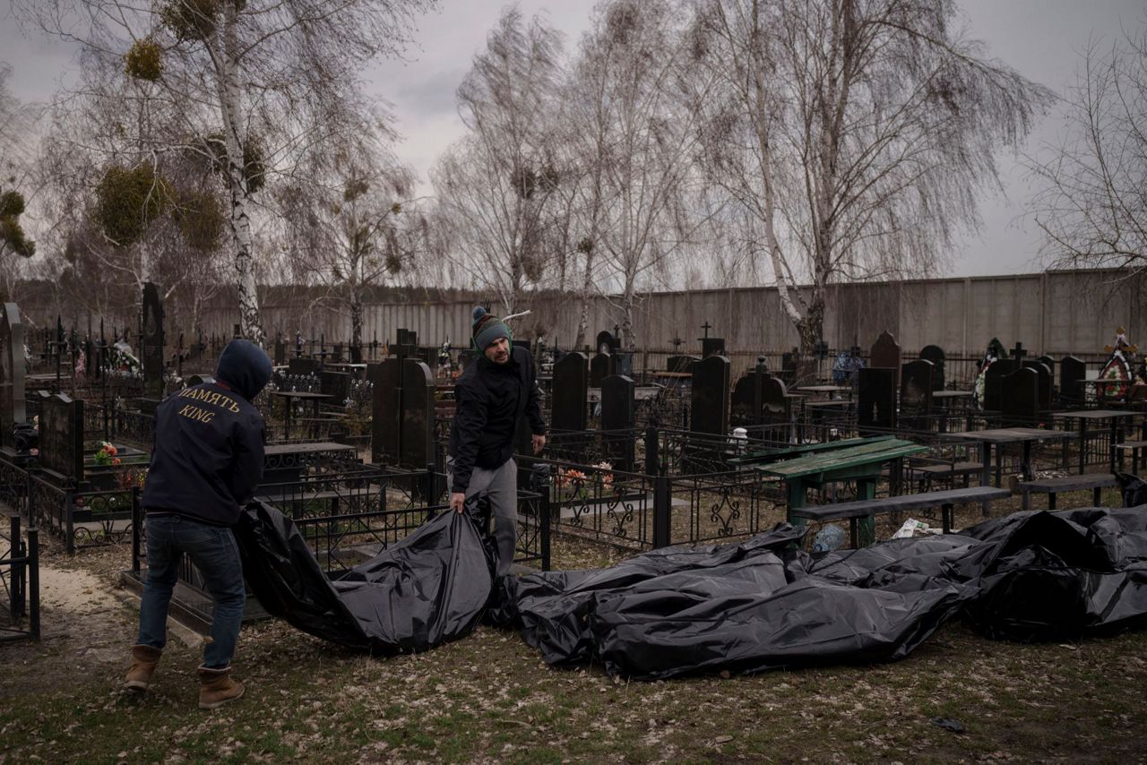 In Bucha, Ukraine, burned, piled bodies among latest horrors