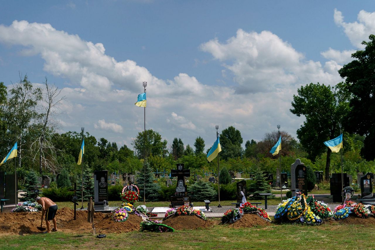 'I will be proud of you forever': A funeral in east Ukraine