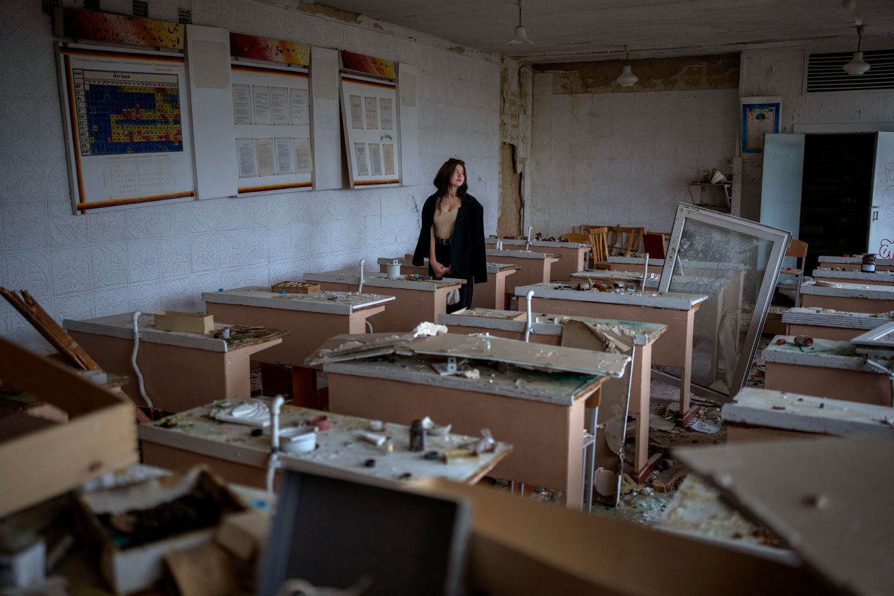 AP PHOTOS: Kids reflect on war at bombed school in Ukraine