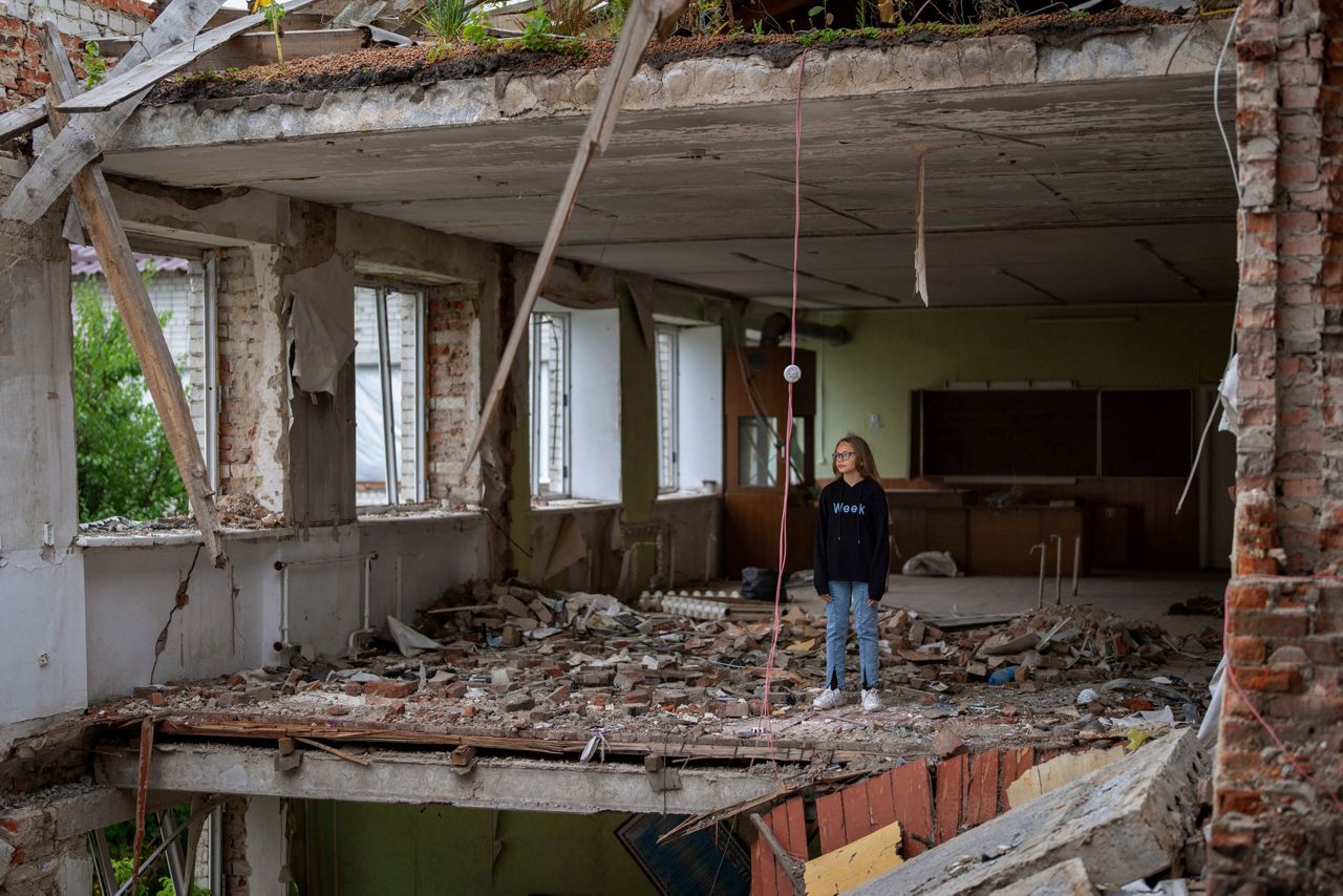 AP PHOTOS: Kids reflect on war at bombed school in Ukraine