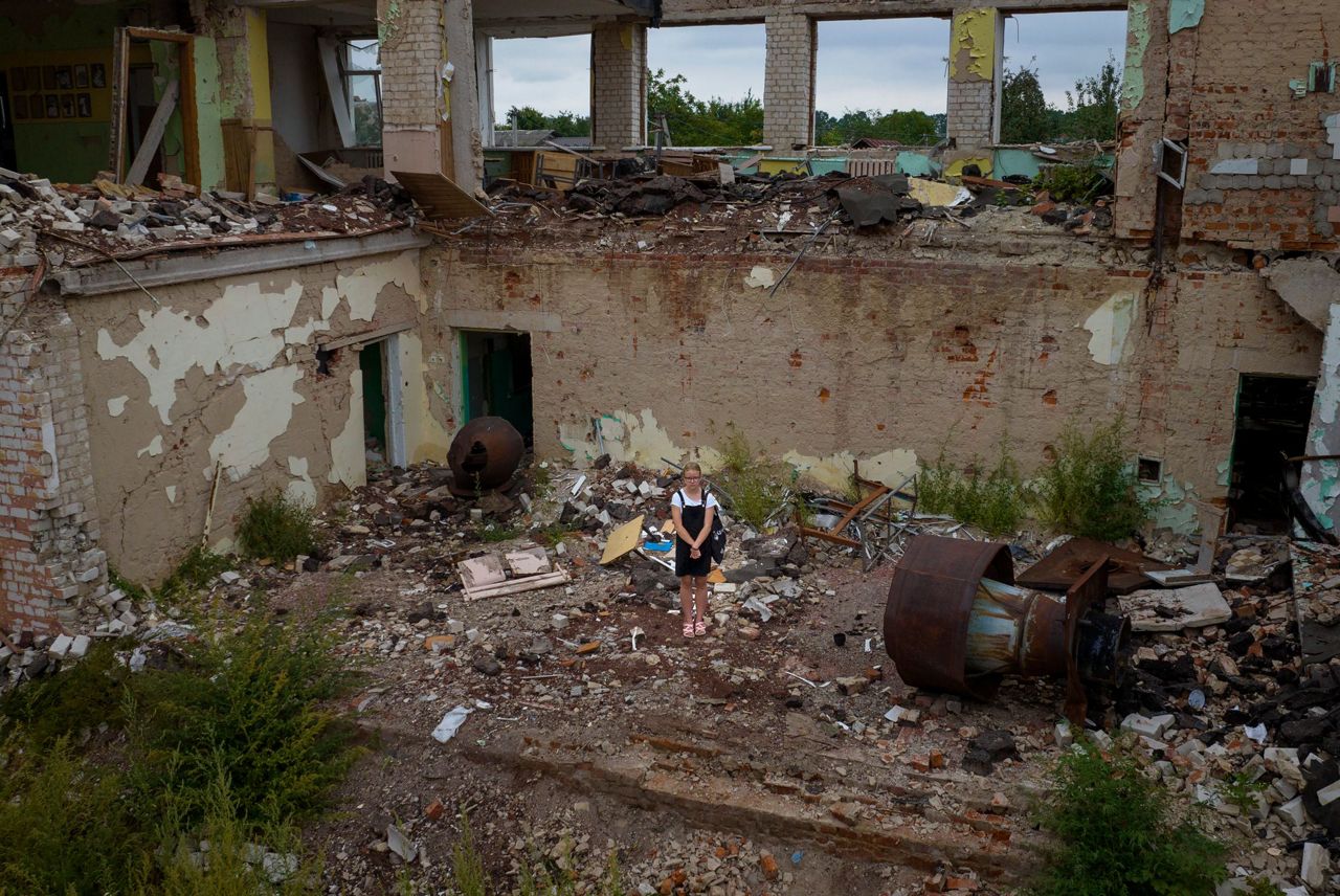 AP PHOTOS: Kids reflect on war at bombed school in Ukraine