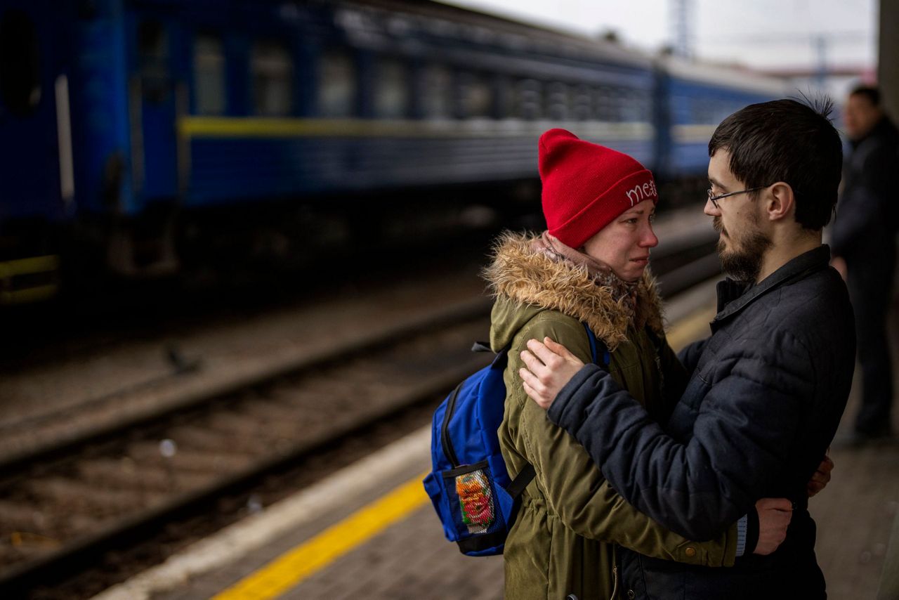 Tearful goodbyes at Kyiv train station during war in Ukraine