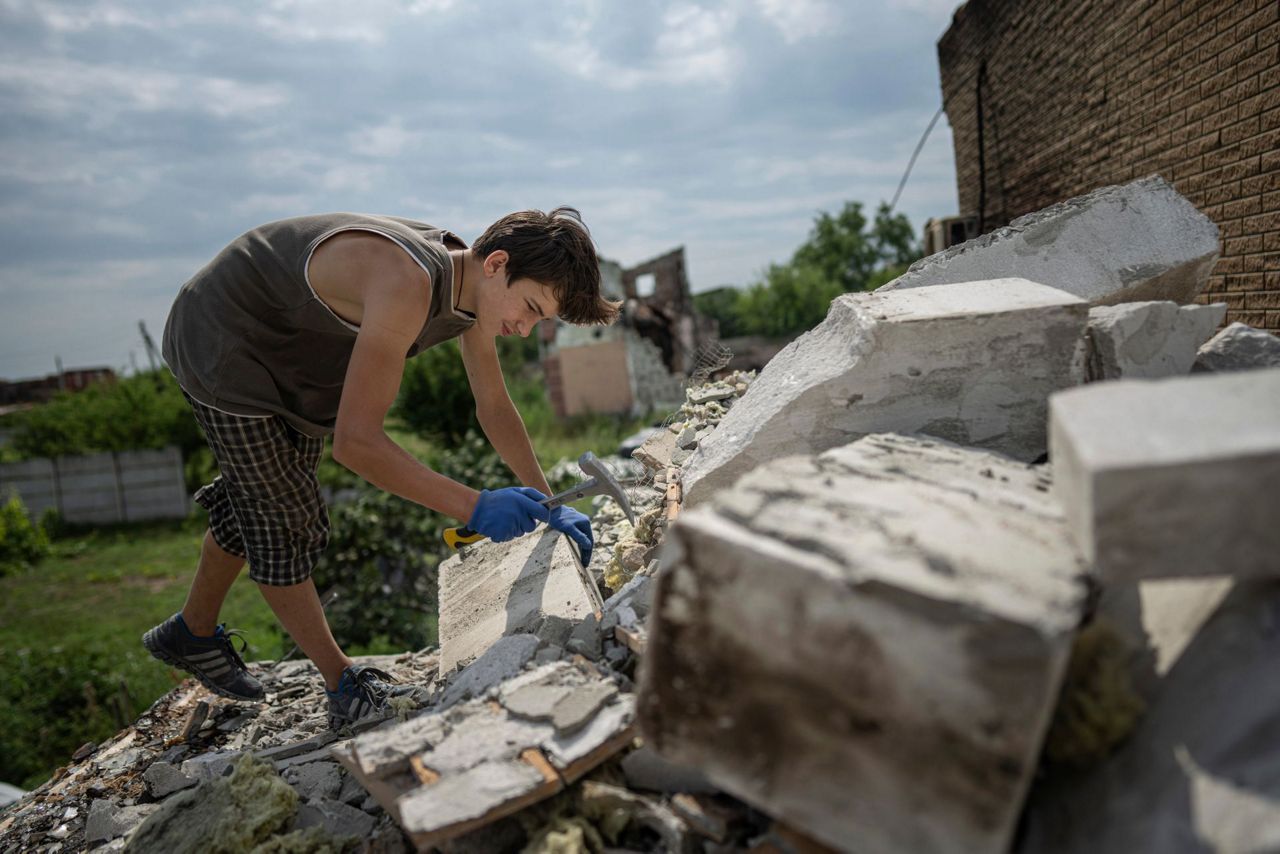 In Ukraine, rebuilding starts with neighbors' help