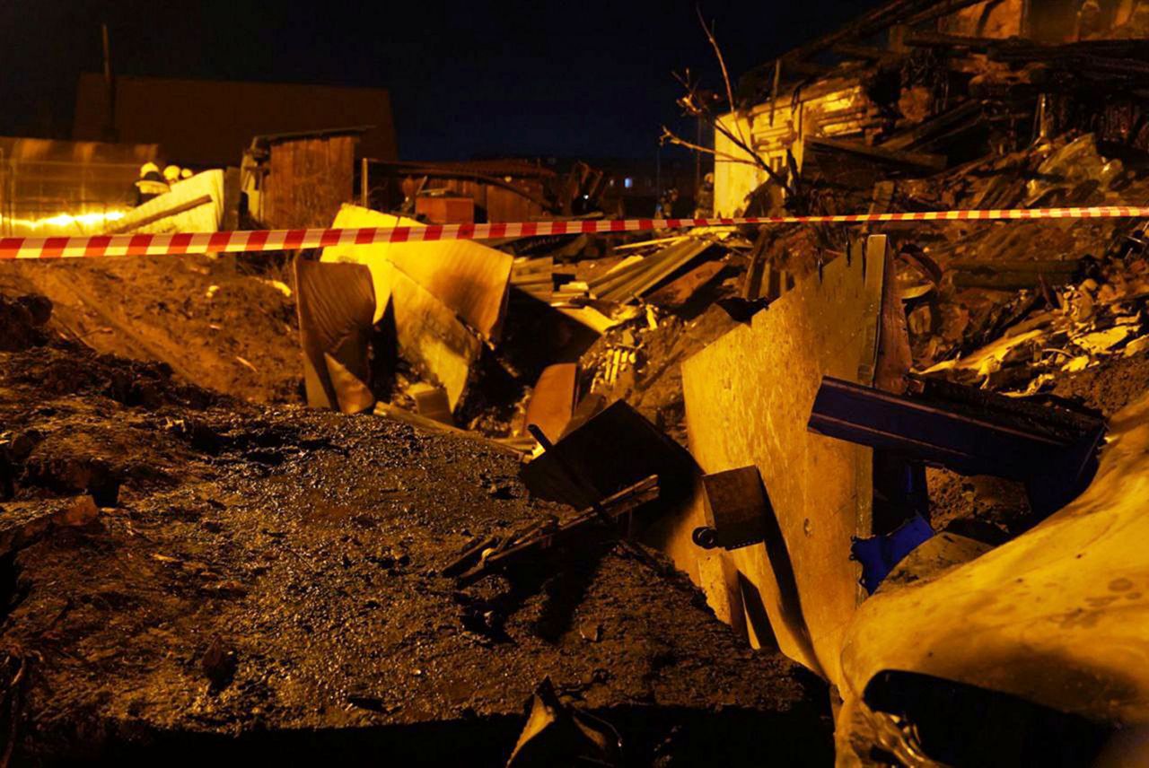 Russian warplane crashes into building in Siberia