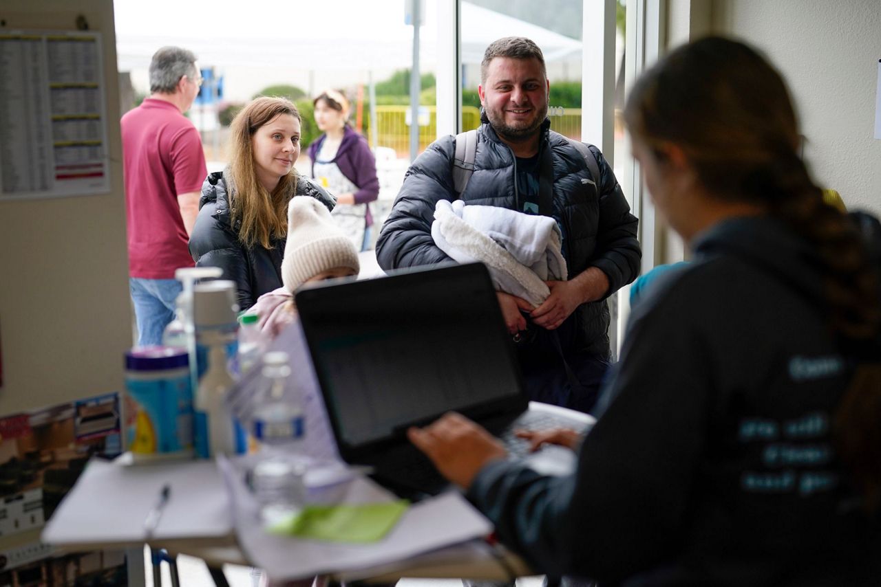 Russians find asylum lifeline to US, but at a high price