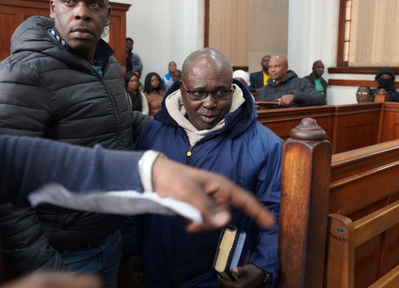 Rwandan genocide suspect appears in court holding Bible after 22 years ...