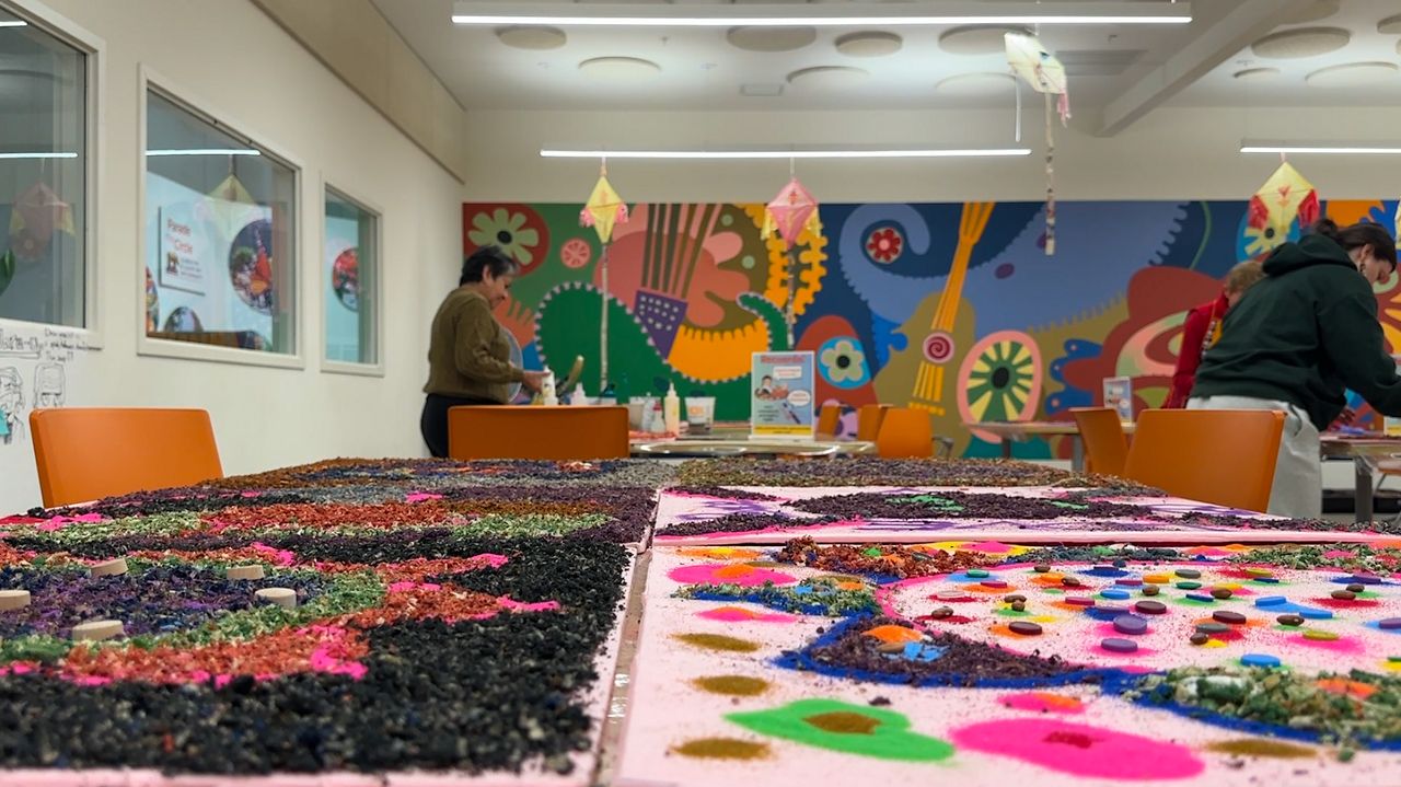 Day of the Dead sawdust carpets, altars celebrate tradition