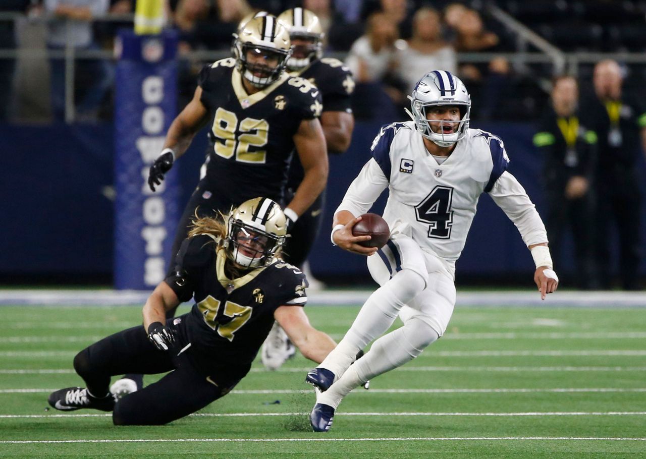 Cowboys stifle Brees, end Saints' 10-game win streak, 13-10