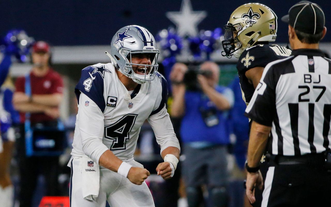 Cowboys stifle Brees, end Saints' 10-game win streak, 13-10