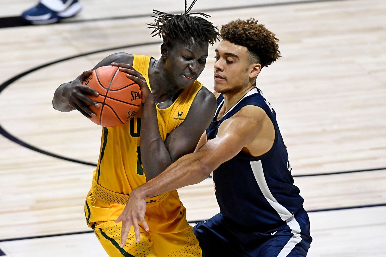 San Francisco stuns No. 4 Virginia 61-60 in Bubbleville