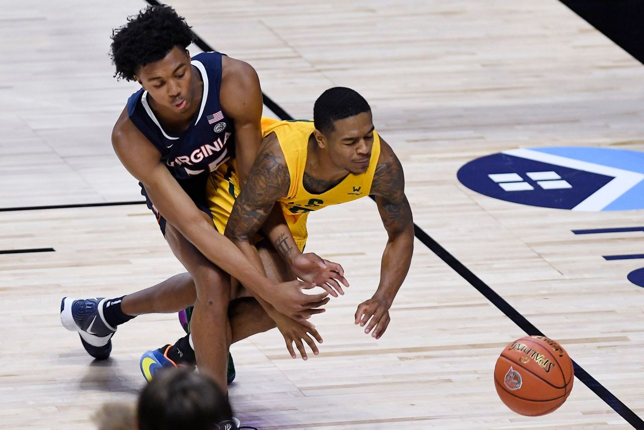 San Francisco stuns No. 4 Virginia 61-60 in Bubbleville