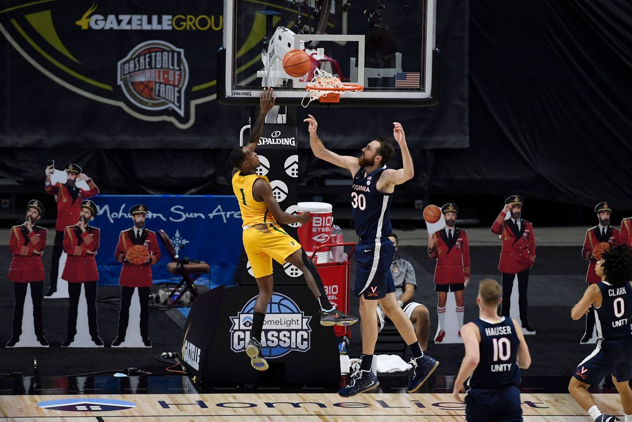 San Francisco stuns No. 4 Virginia 61-60 in Bubbleville