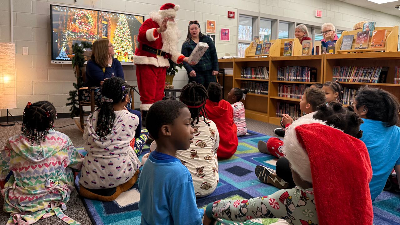Santa Claus visits deaf students