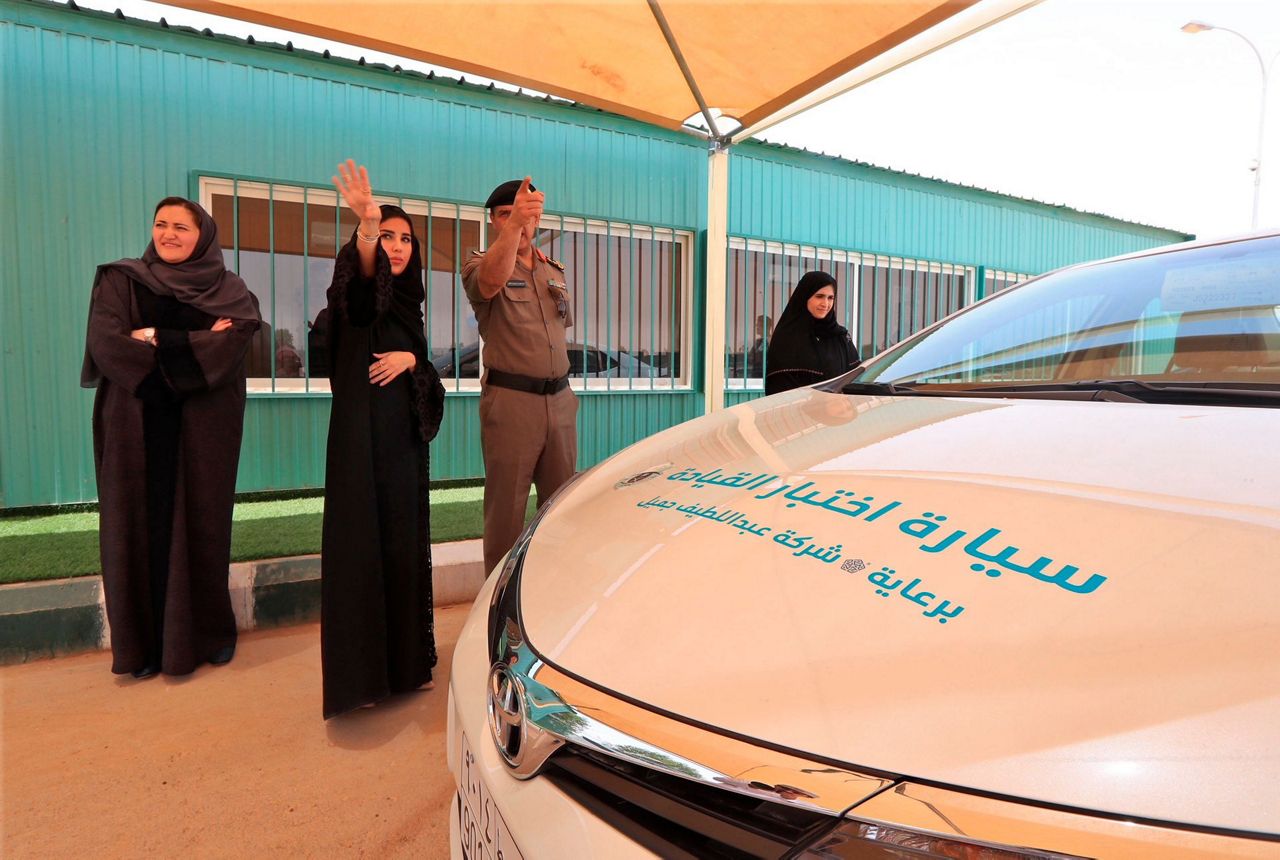 First Saudi women receive driving licenses amid crackdown