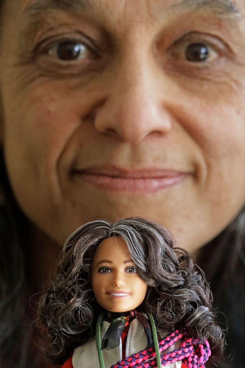 Forest ecologist helps refashion Barbie dolls as scientists