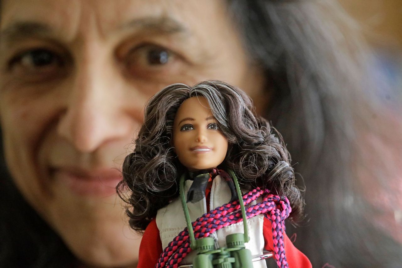 Forest ecologist helps refashion Barbie dolls as scientists