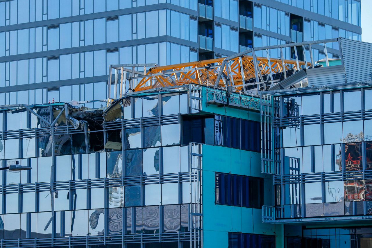 Crane collapses in downtown Seattle on Saturday