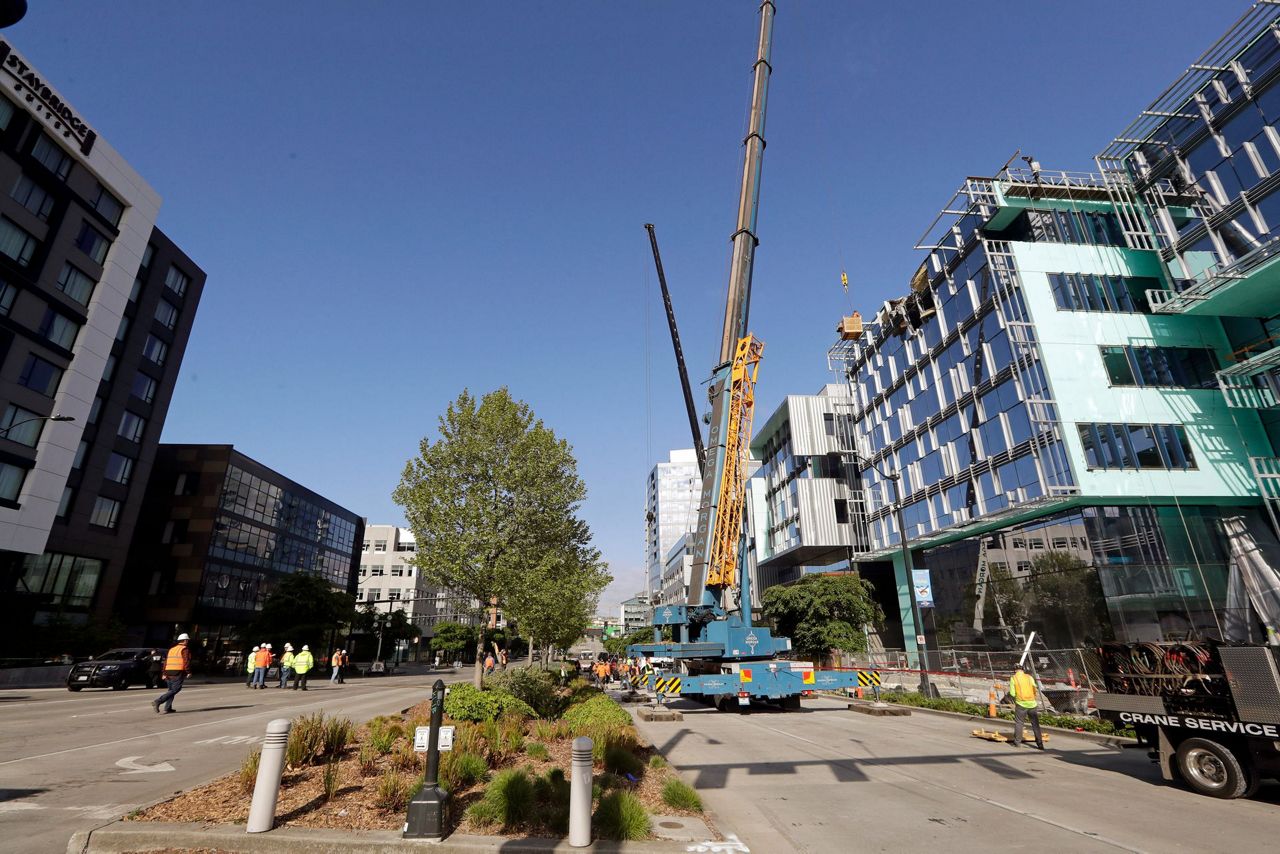 The Latest: Seattle college says student was killed by crane