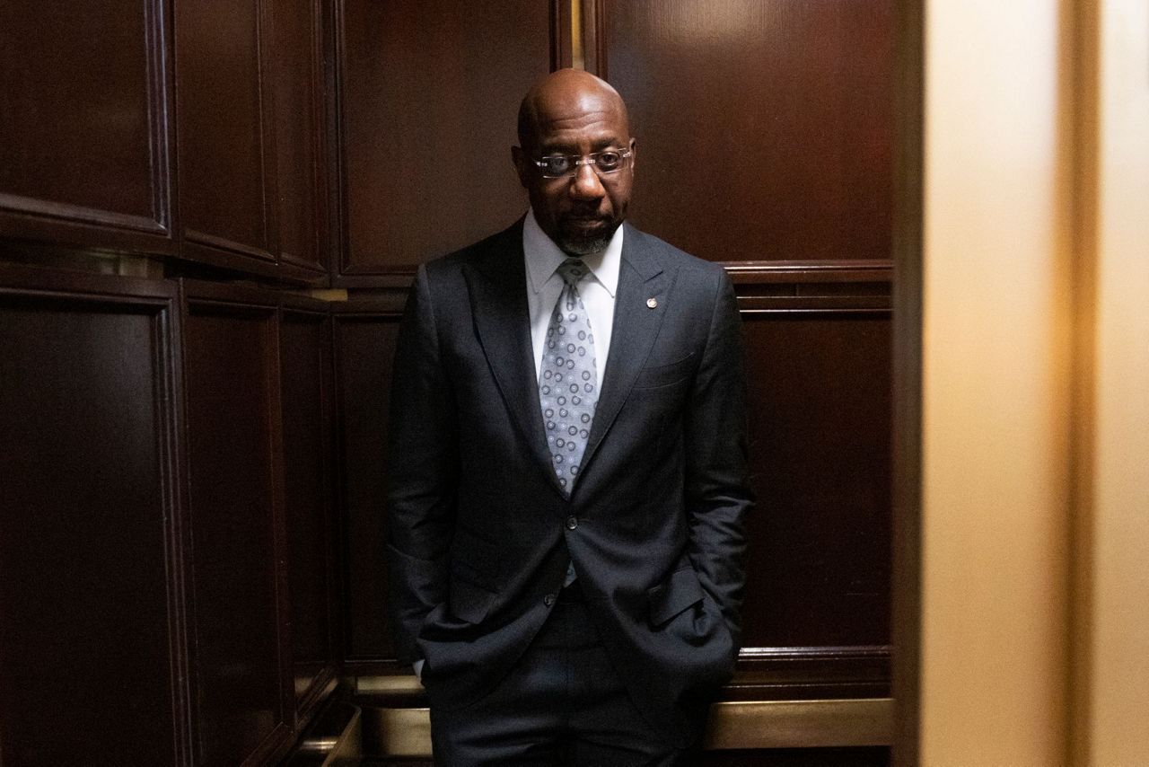 Warnock, deal-maker yet party loyalist, settles into Senate