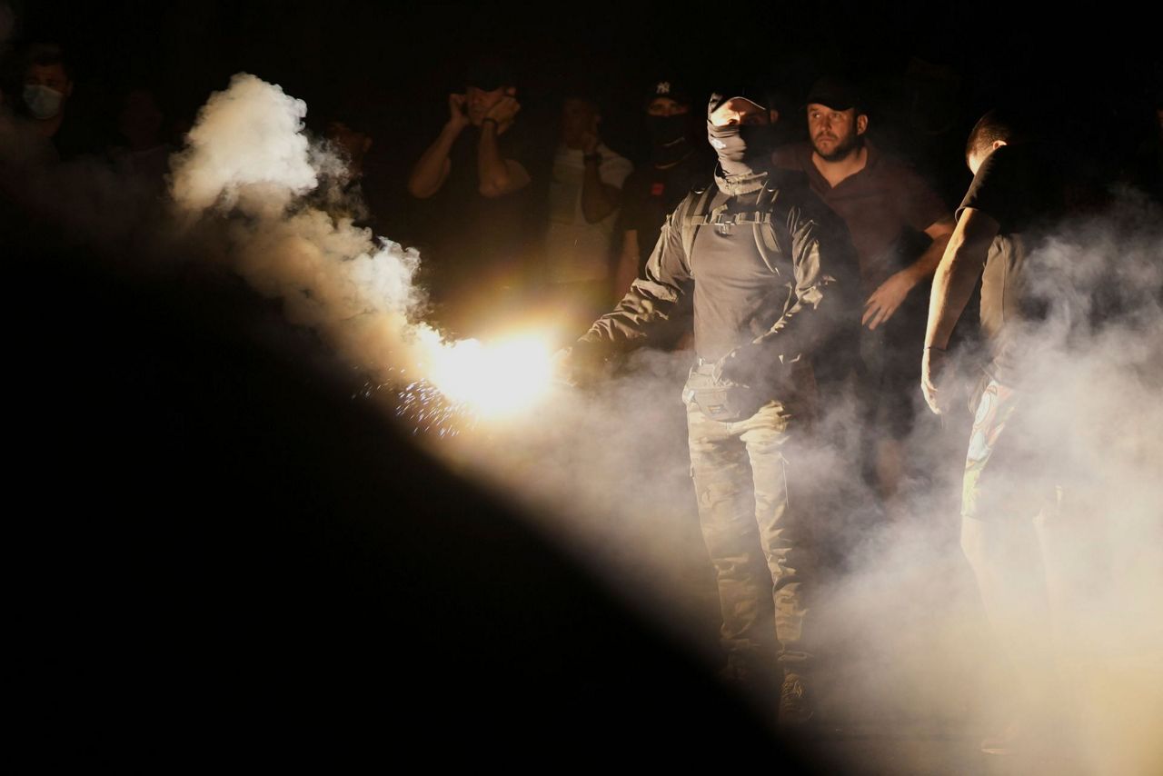 Dozens injured and detained as anti-government protests in Serbia ...