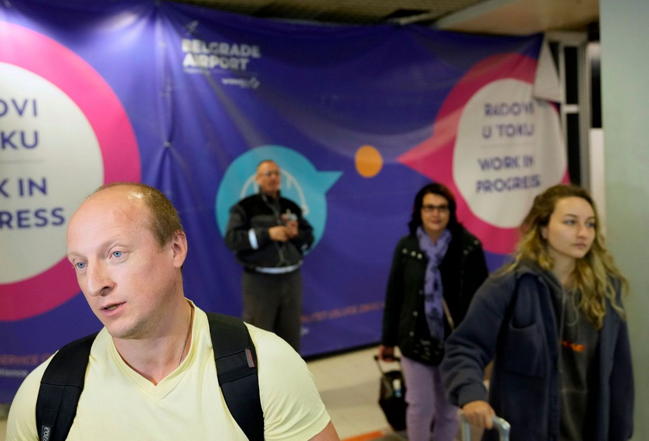 Russians rush for flights out amid partial reservist call-up