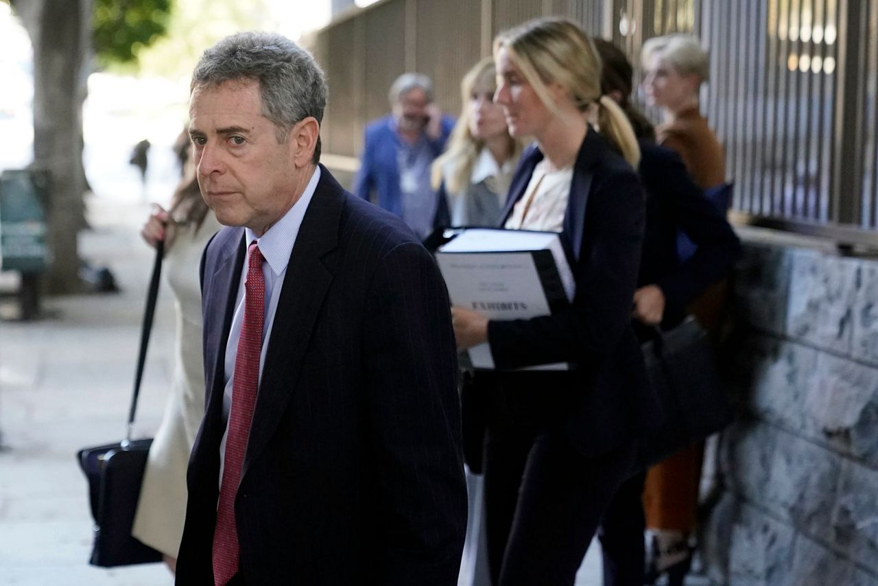 Weinstein lawyer presses woman over absence of rape evidence