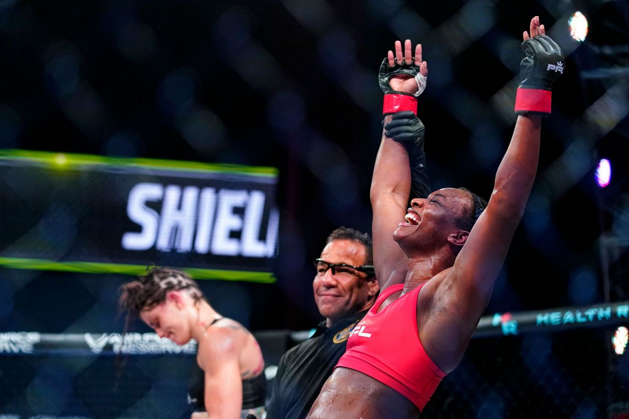 Olympic, professional boxing champ Shields wins MMA debut