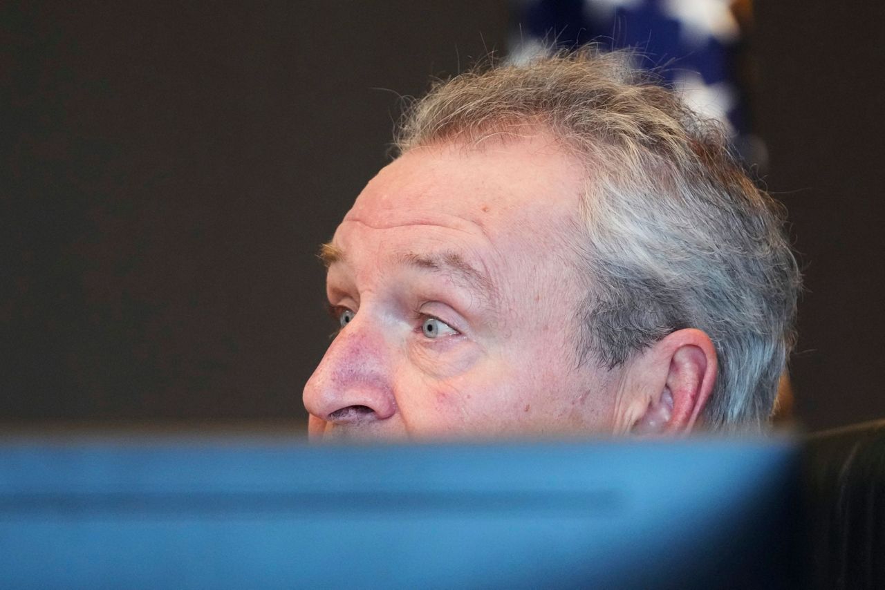 Father of July 4th parade shooting suspect turns himself in to begin ...