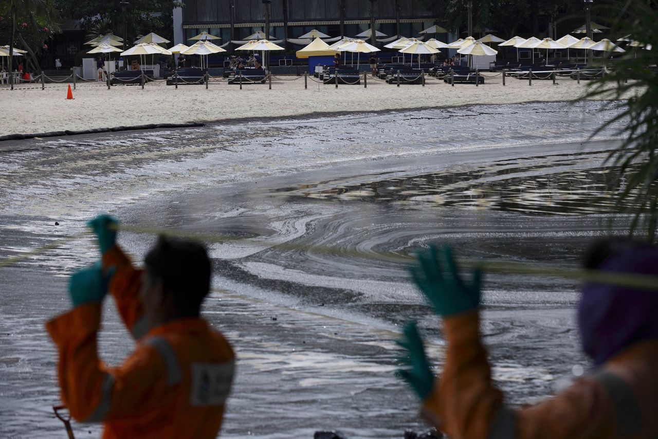 Singapore says dredger that hit tanker reported sudden loss of control ...