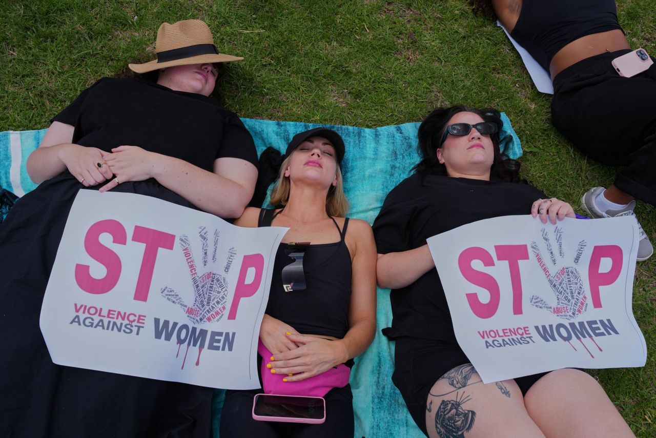 South African women stage lie-down protest against gender-based ...