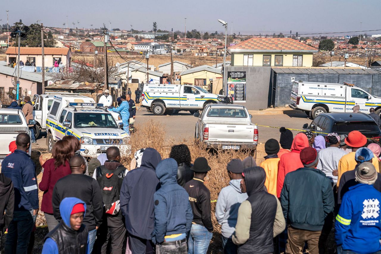 South Africa police say 14 dead in bar shooting in Soweto